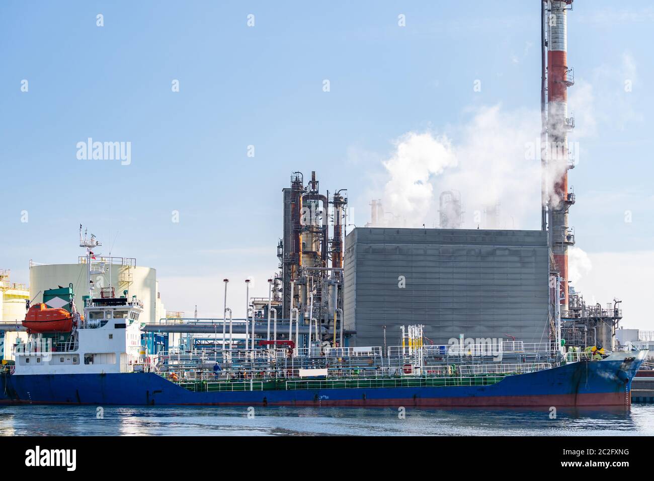 Tanker boat loading fuel from oil Chemical Factory in Kawasaki Japan ...