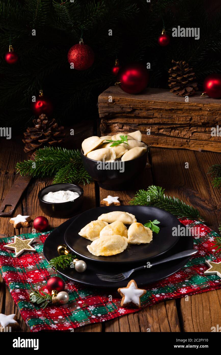 Polish Christmas pierogi with sauerkraut and mushrooms Stock Photo - Alamy