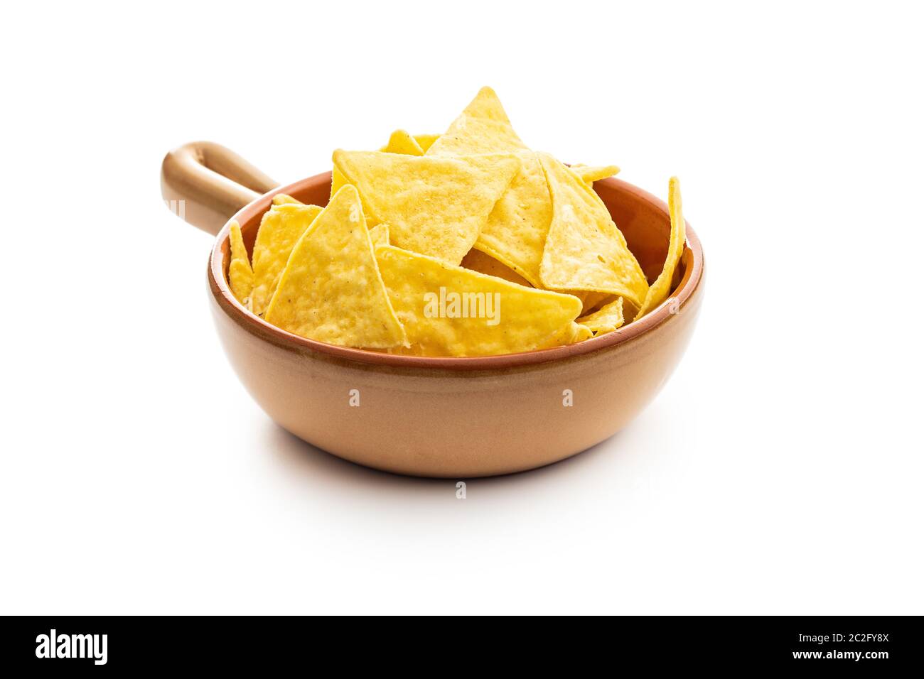 Corn nacho chips. Yellow tortilla chips in bowl isolated on white ...