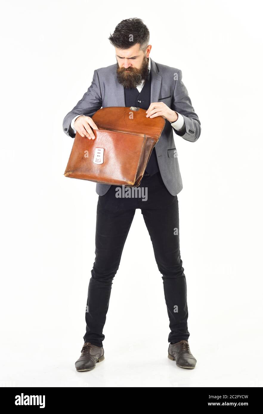 Bankruptcy and crisis concept. Bearded man opens vintage briefcase ...