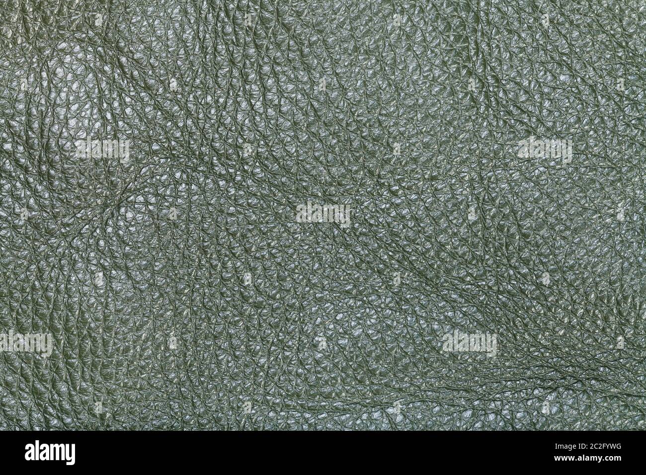 textured background from dark olive green leather close up Stock Photo ...