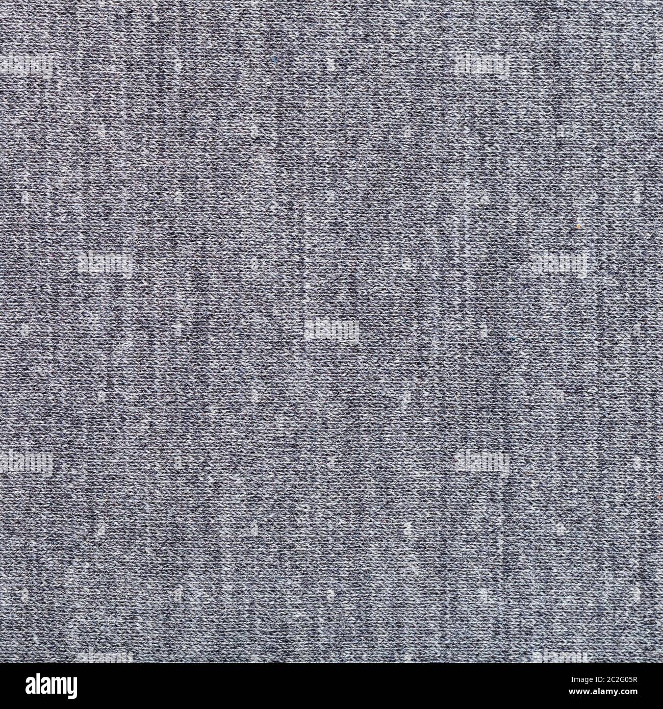 textile vertical background - interlacing threads in gray wool jersey ...