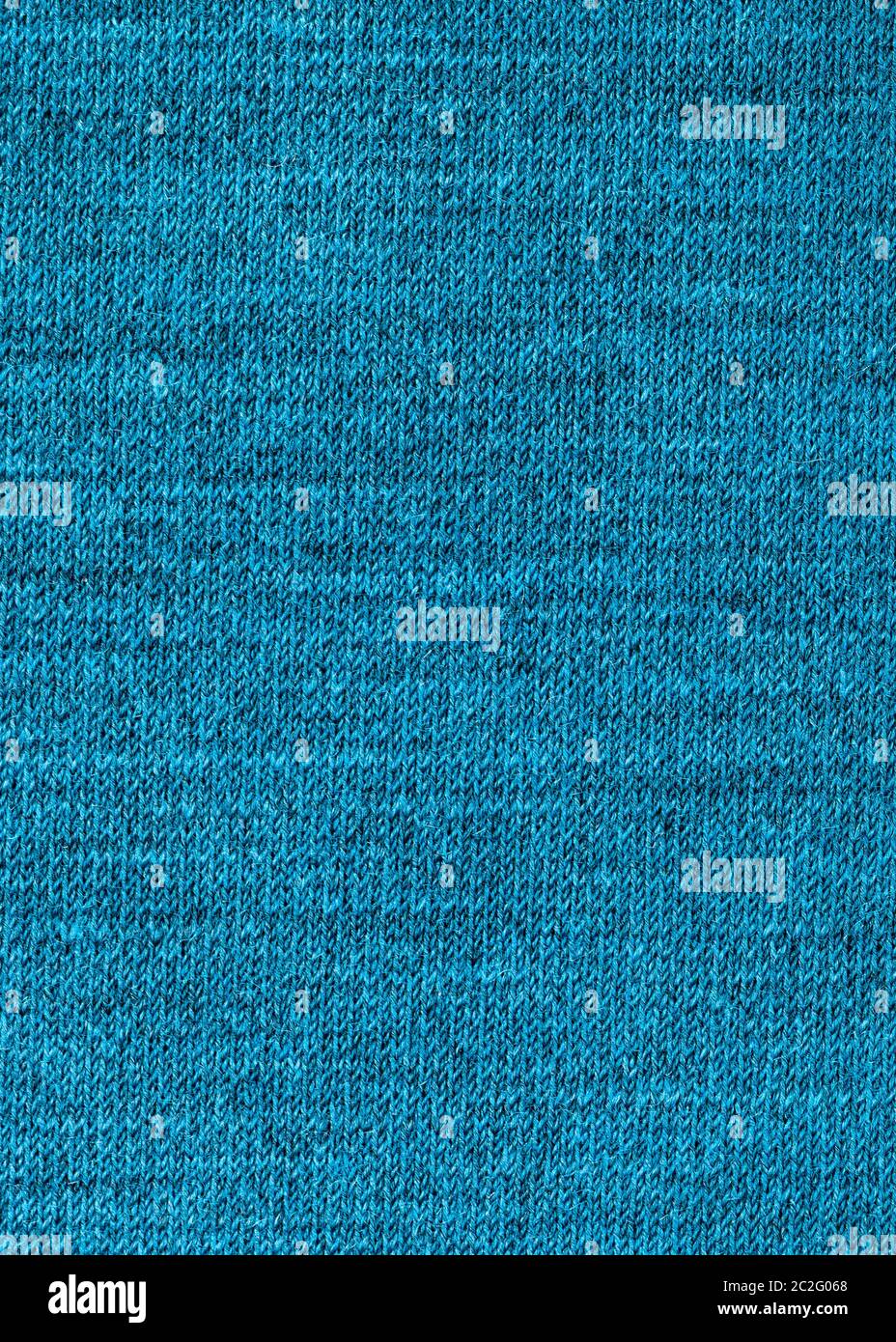 textile vertical background - interlacing threads in wool jersey ...