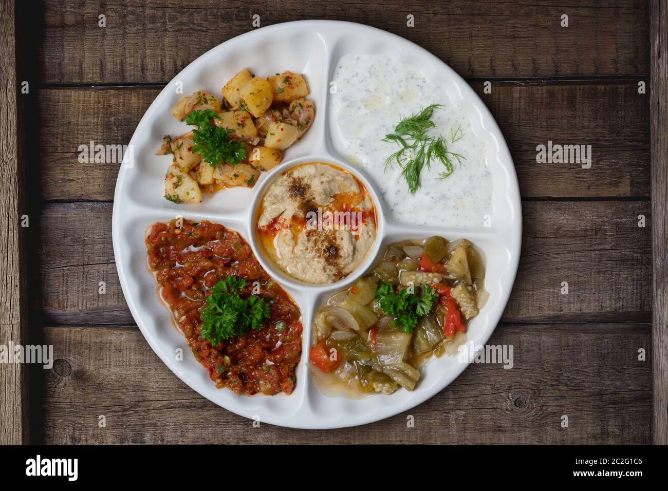 Mix plate arabic food with vegetarian spread starters isolated on ...