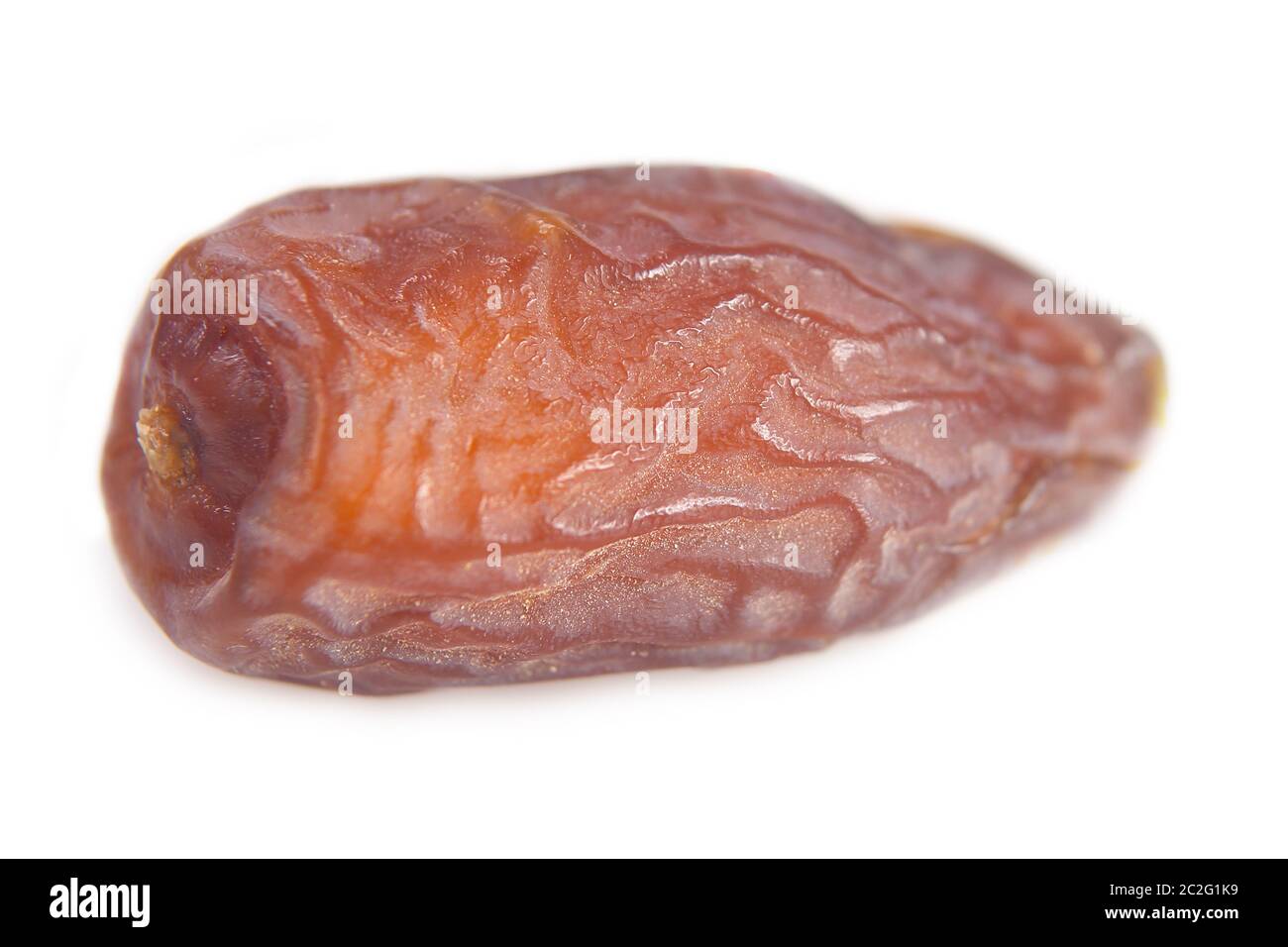 dried dates isolated on white background Stock Photo - Alamy