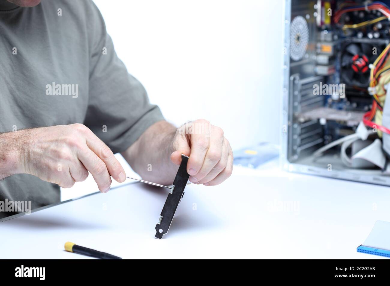 computer technician is repairing a desktop computer Stock Photo - Alamy