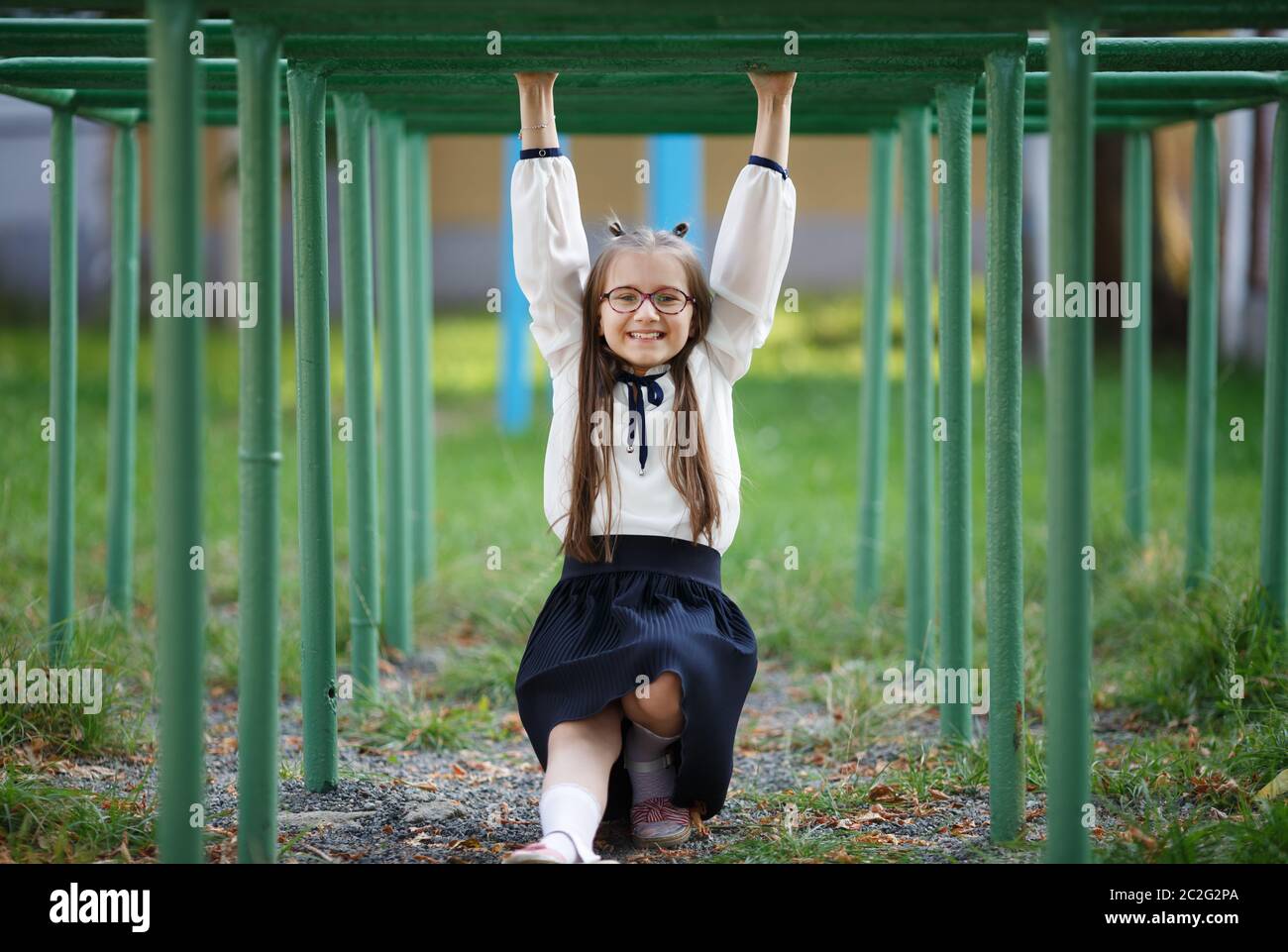 Girl playground uniform hi-res stock photography and images - Alamy