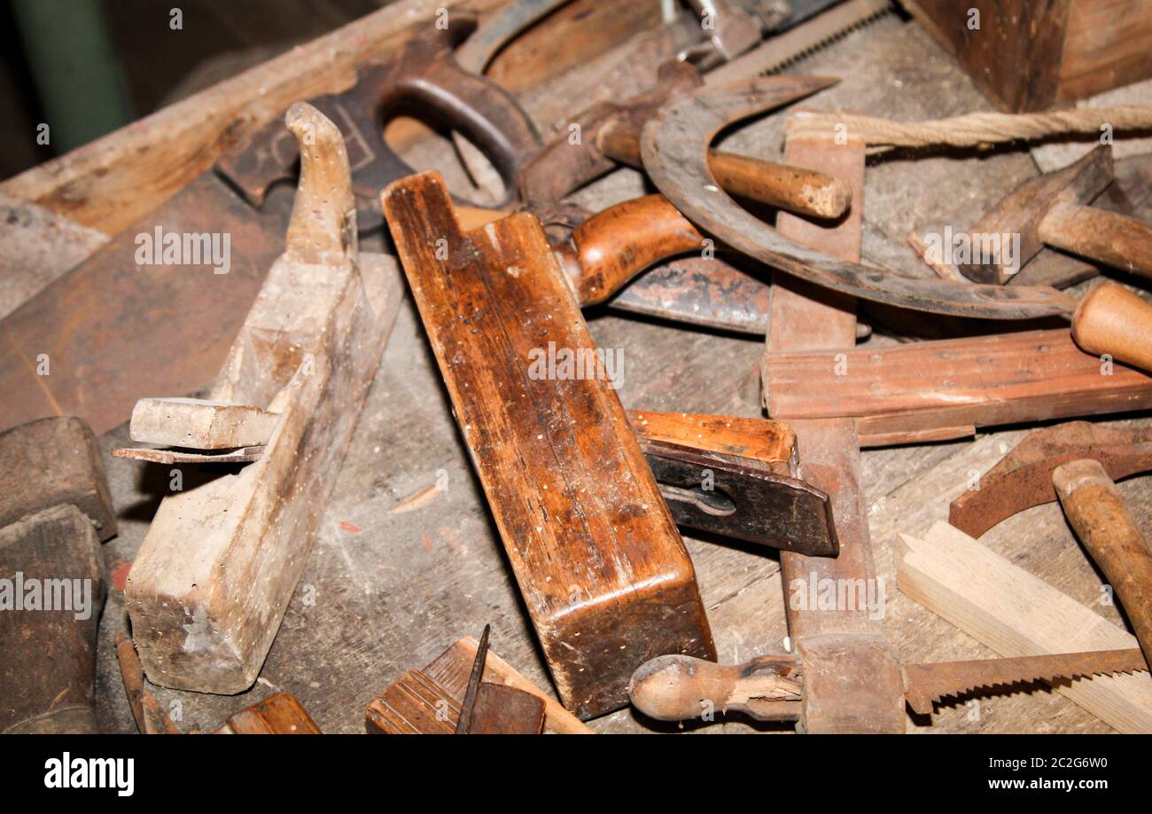 planing saws lie on a carpenter's bench Stock Photo - Alamy