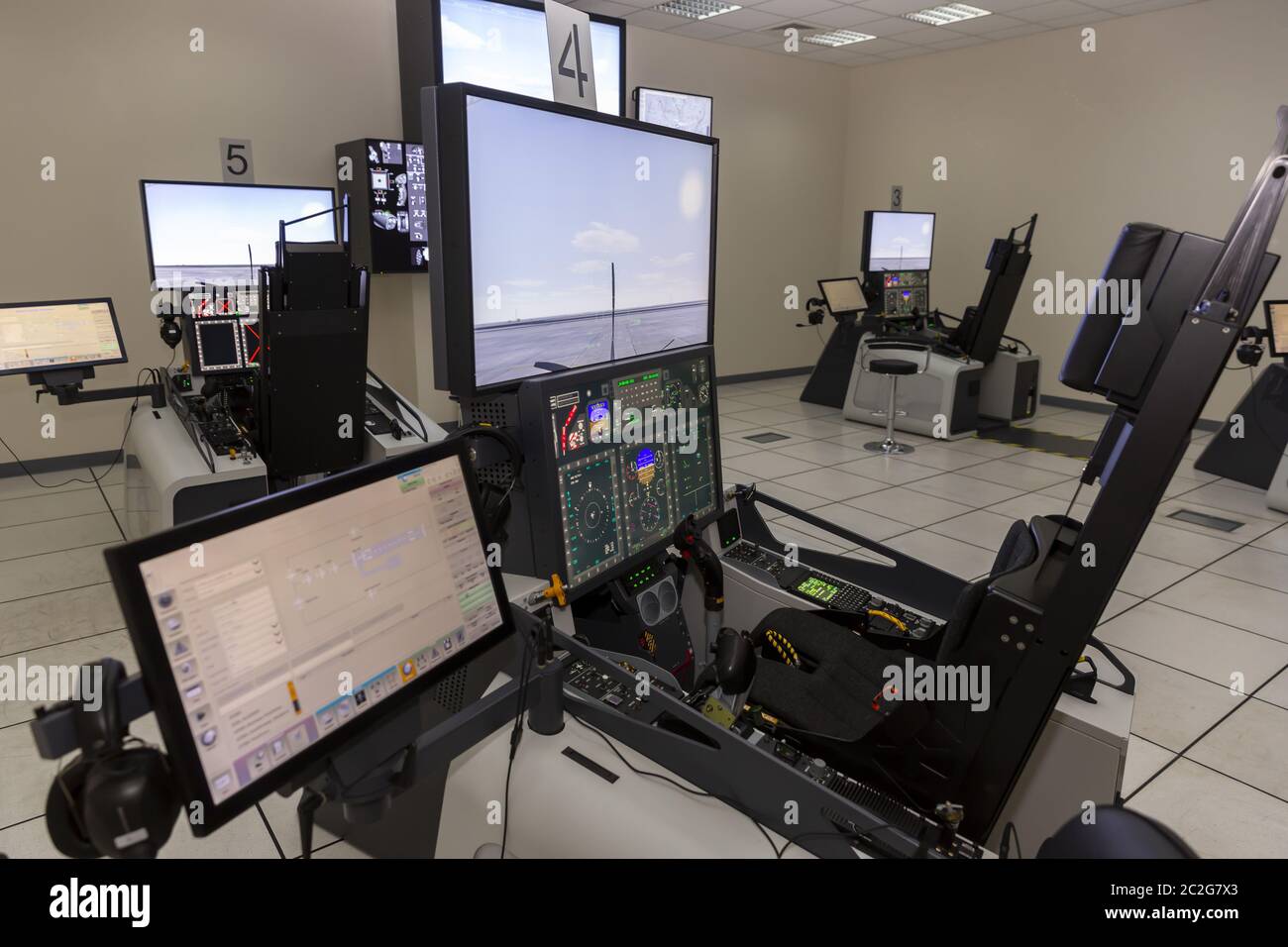Fighter aircraft simulator training room Stock Photo - Alamy