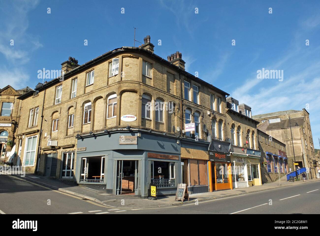shops and buildings on high street in sowerby bridge in west yorkshire ...