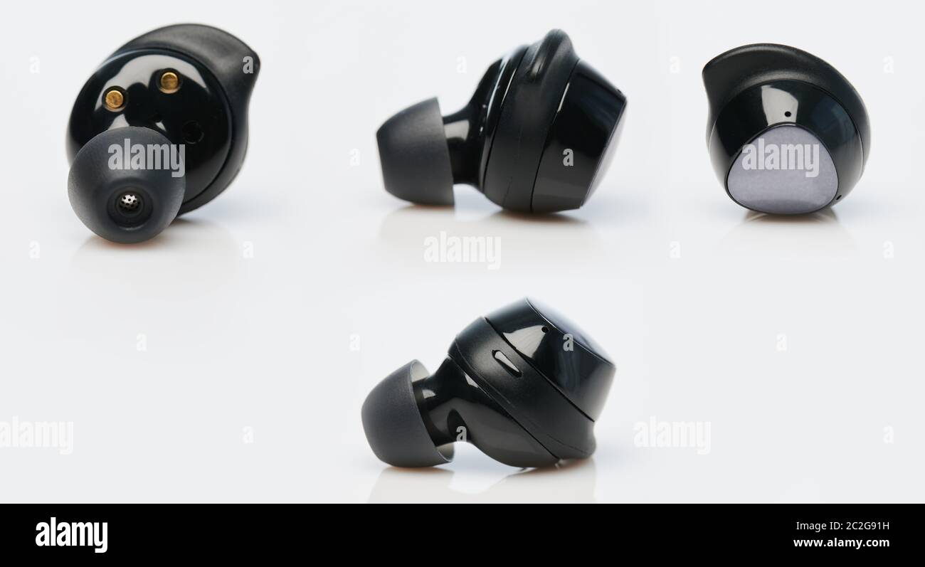 Different views of wireless earphones isolated on white background ...