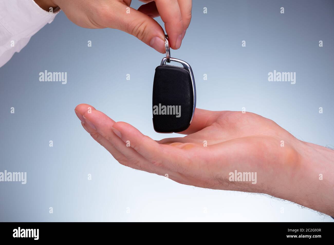 Car key handover hi-res stock photography and images - Alamy