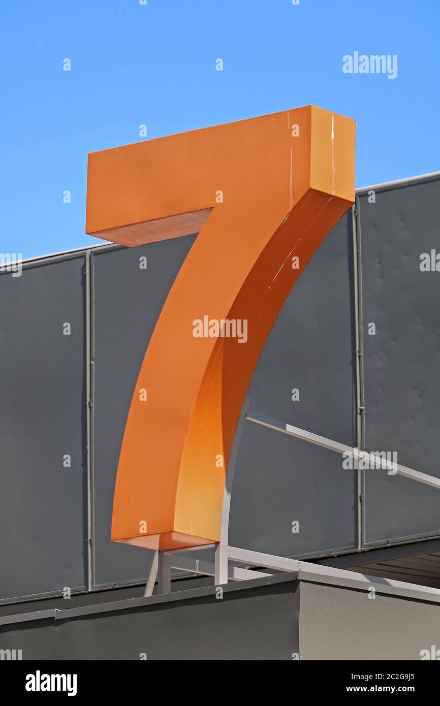 Number seven figure on building facade exterior Stock Photo - Alamy