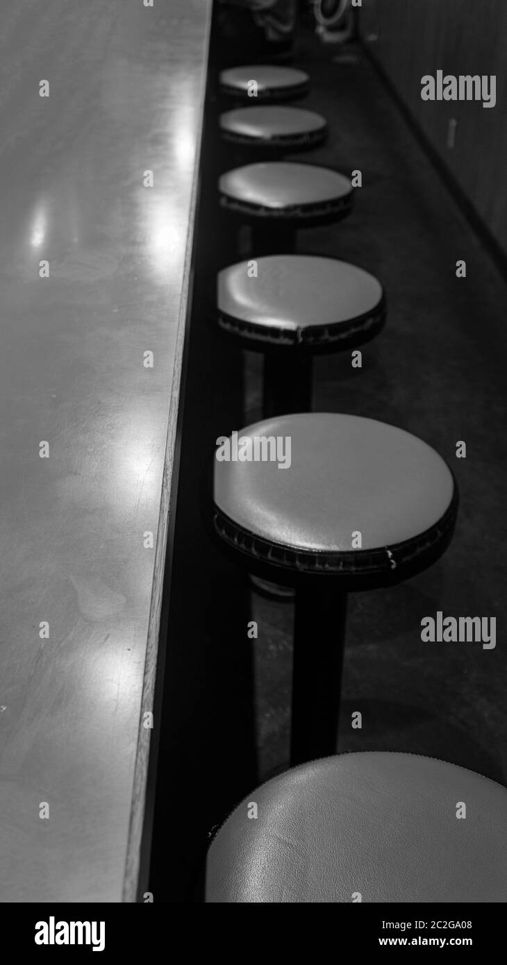 round seats red interior retro style pub classic black white Stock ...