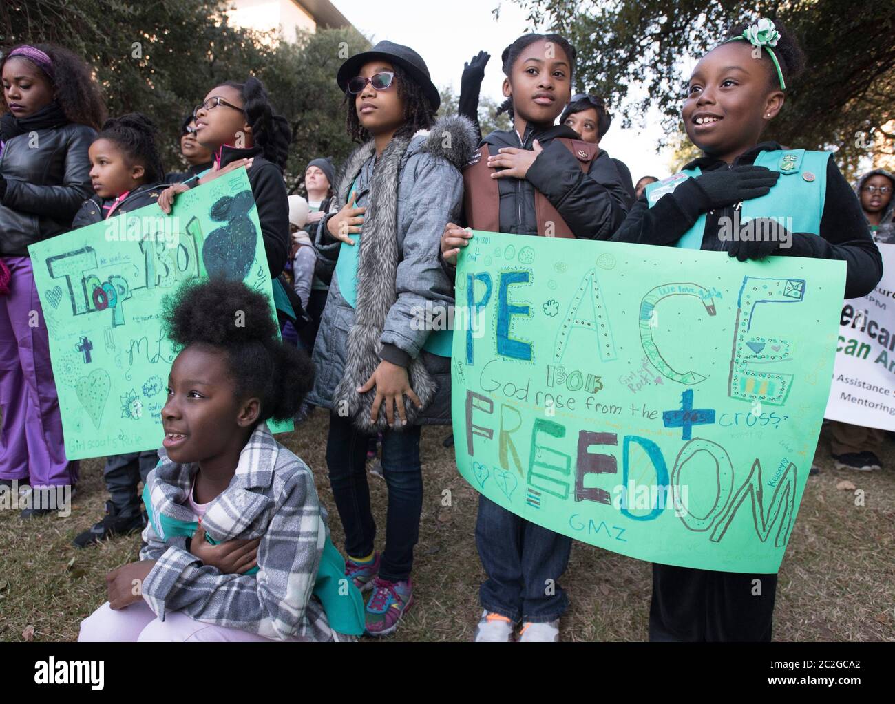 Austin Texas USA, January 18 2016: Girl Scouts holding hand-made signs ...