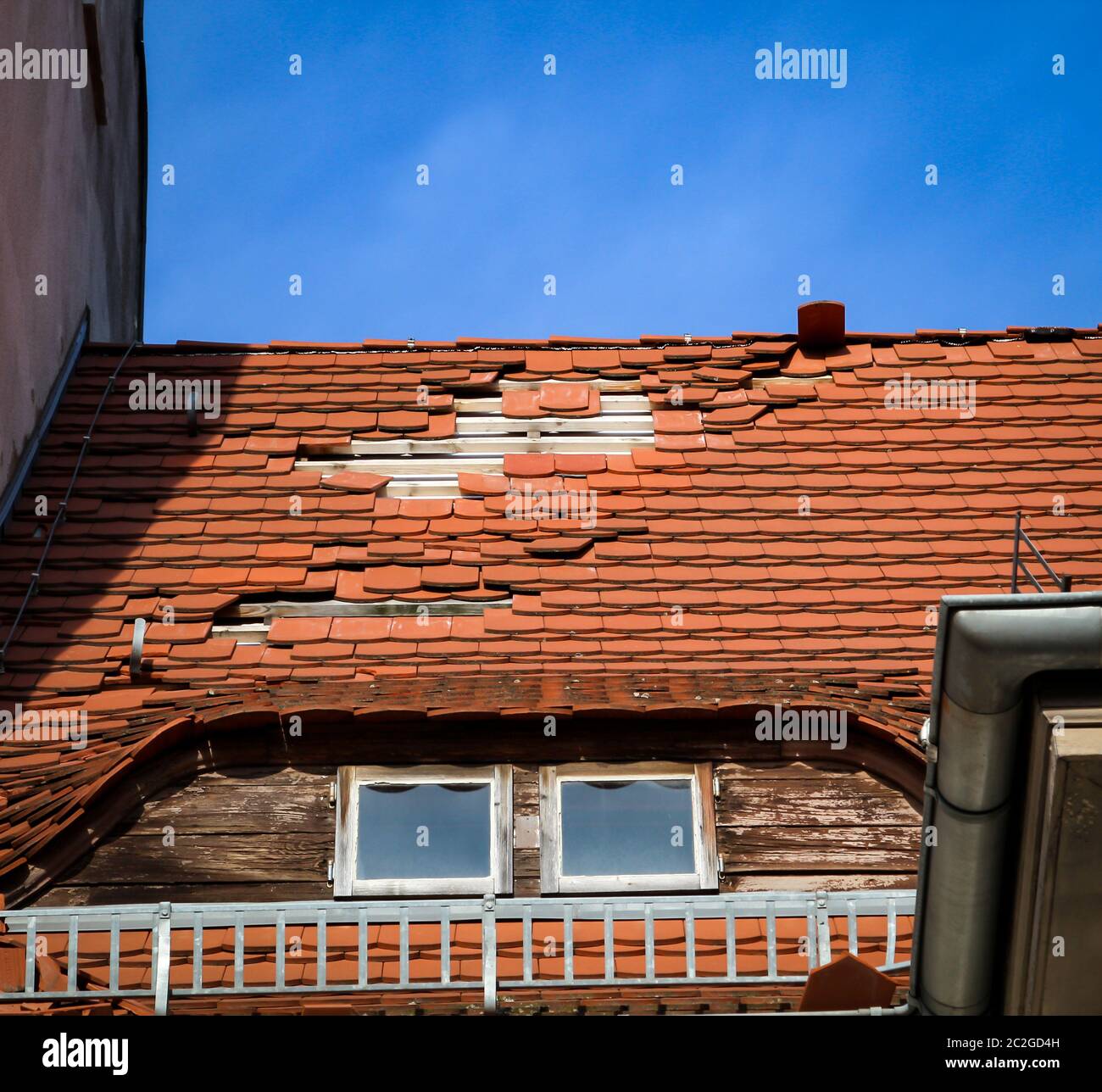 a roof damage after a storm Stock Photo - Alamy