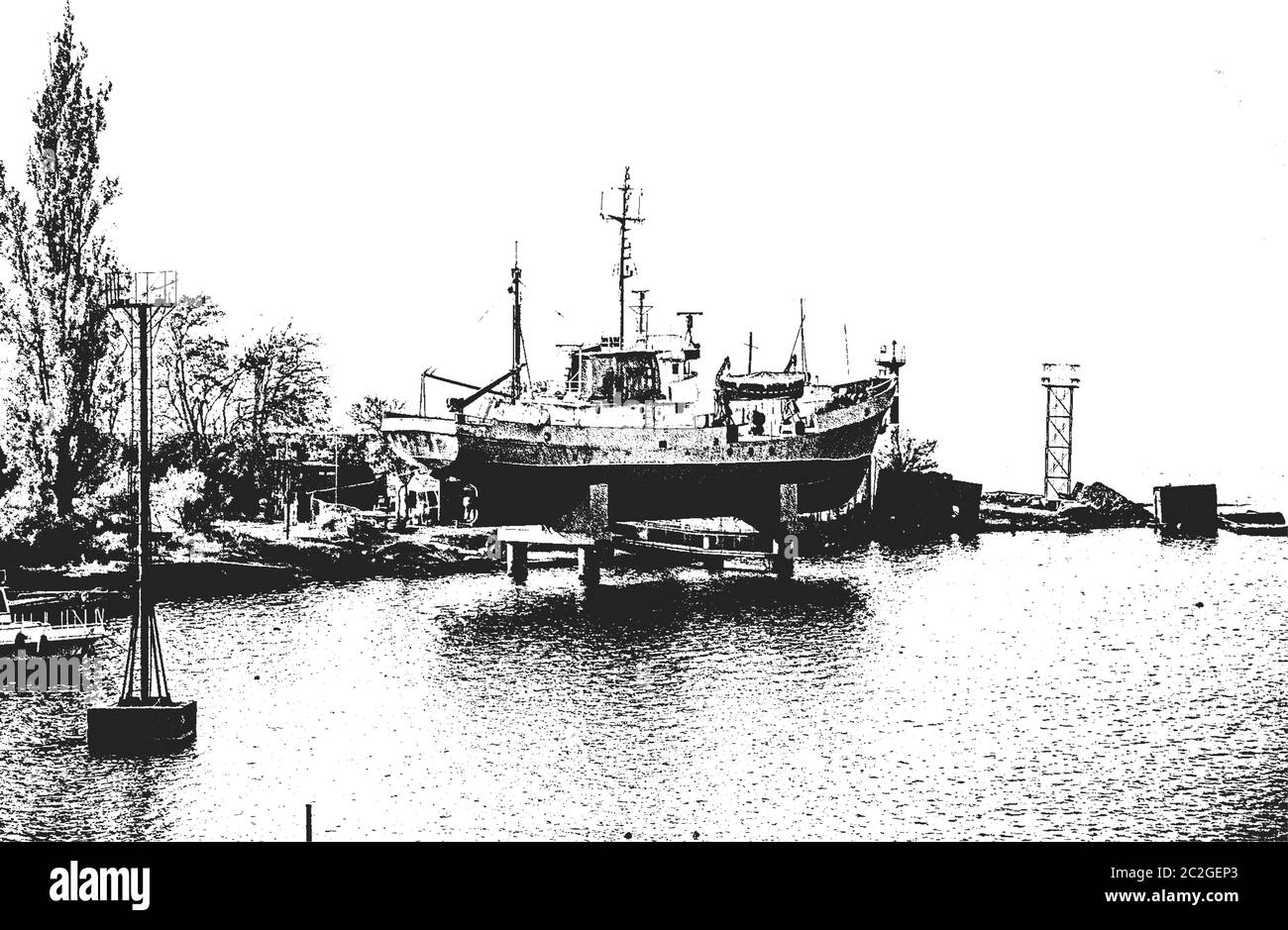 Boat on the stocks, in the port area. Installed on concrete supports ...