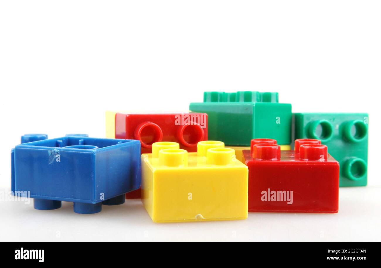 Close-Up Of Plastic Building Blocks Against White Background Stock ...