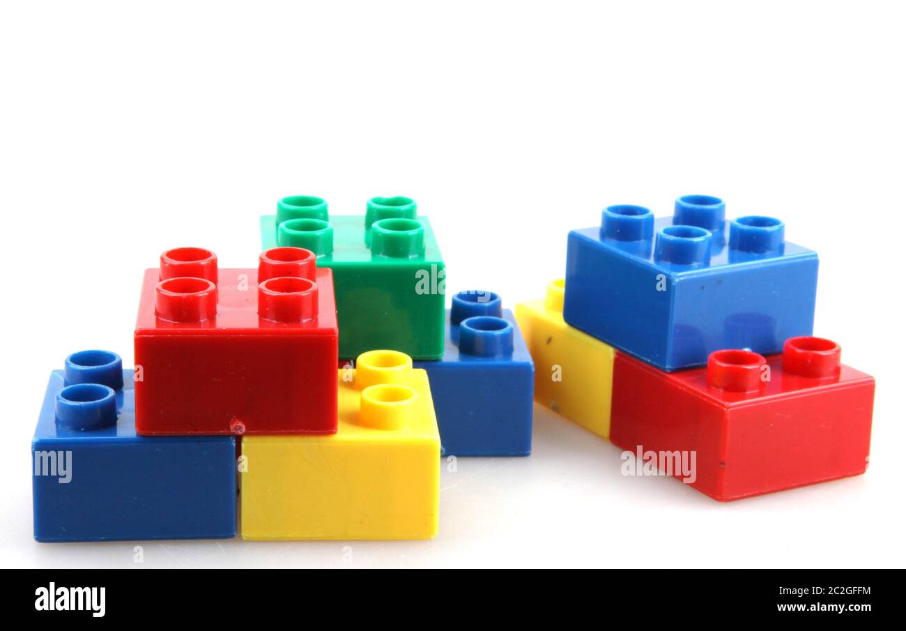 Close-Up Of Plastic Building Blocks Against White Background Stock ...