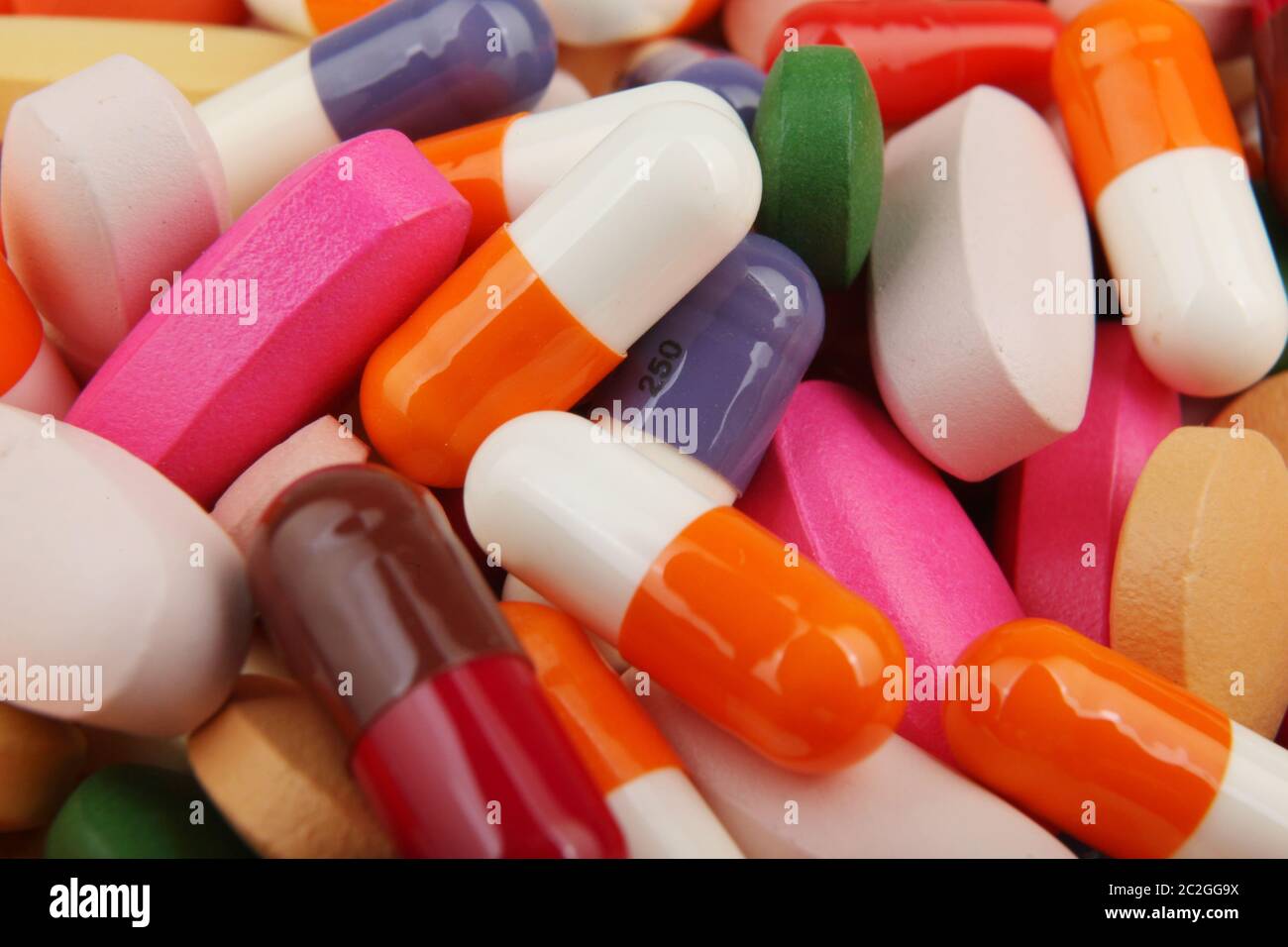 Top view of large amount of pills Stock Photo - Alamy