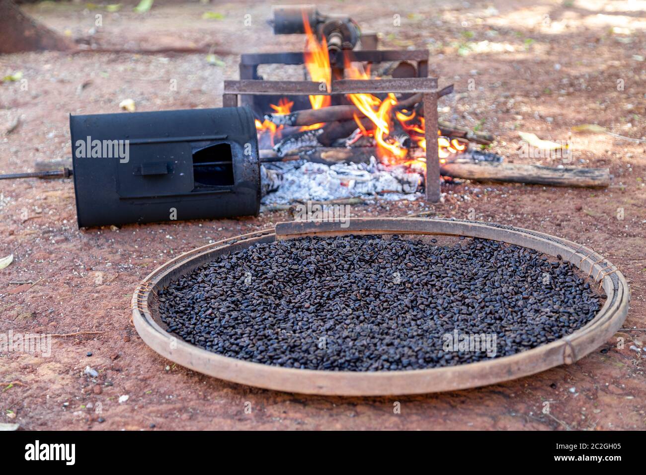roasting coffee the old farm way, manual roaster, wood fire Stock Photo ...