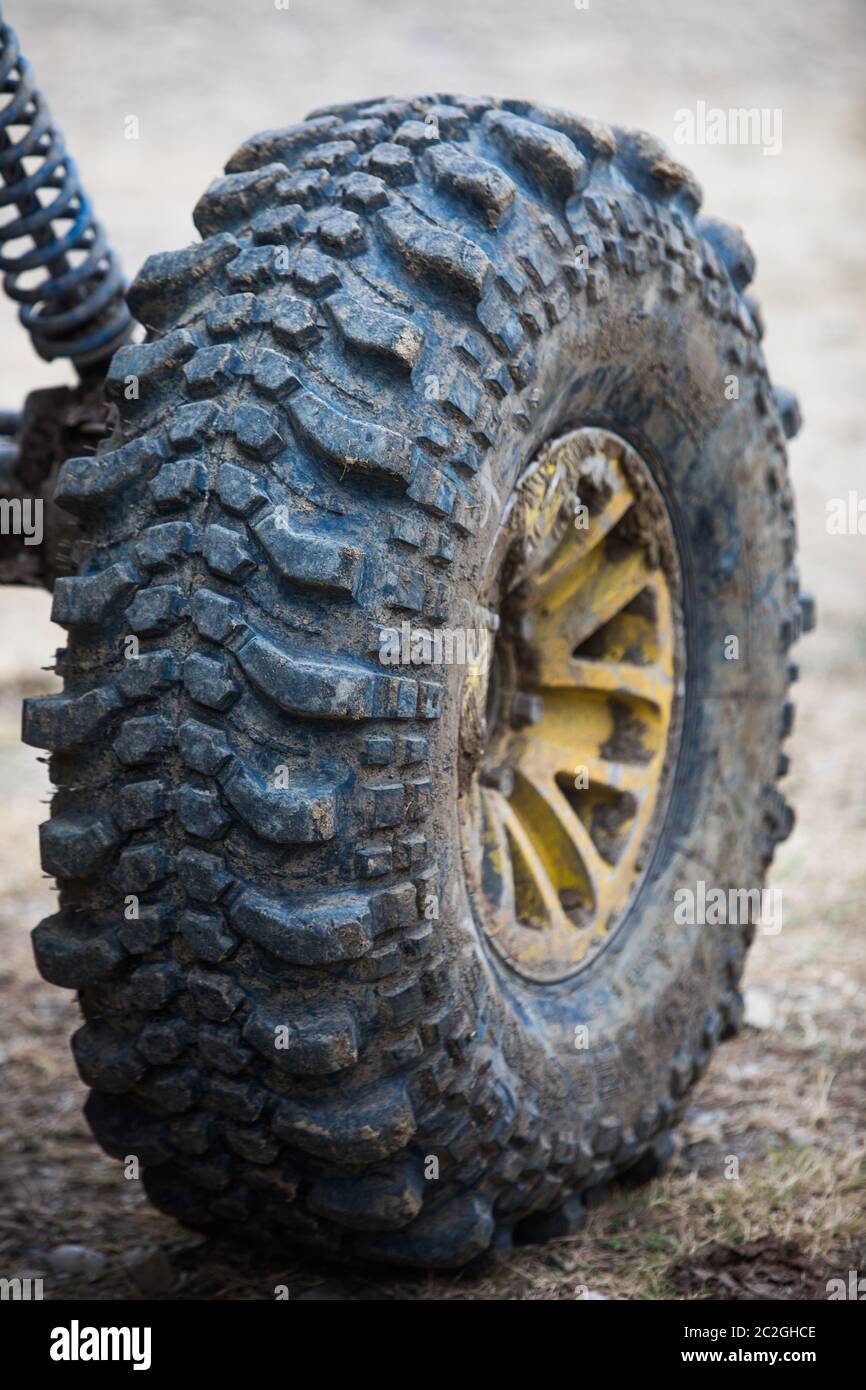 Close up shot of a muddy off road tire on a 4x4 car Stock Photo - Alamy