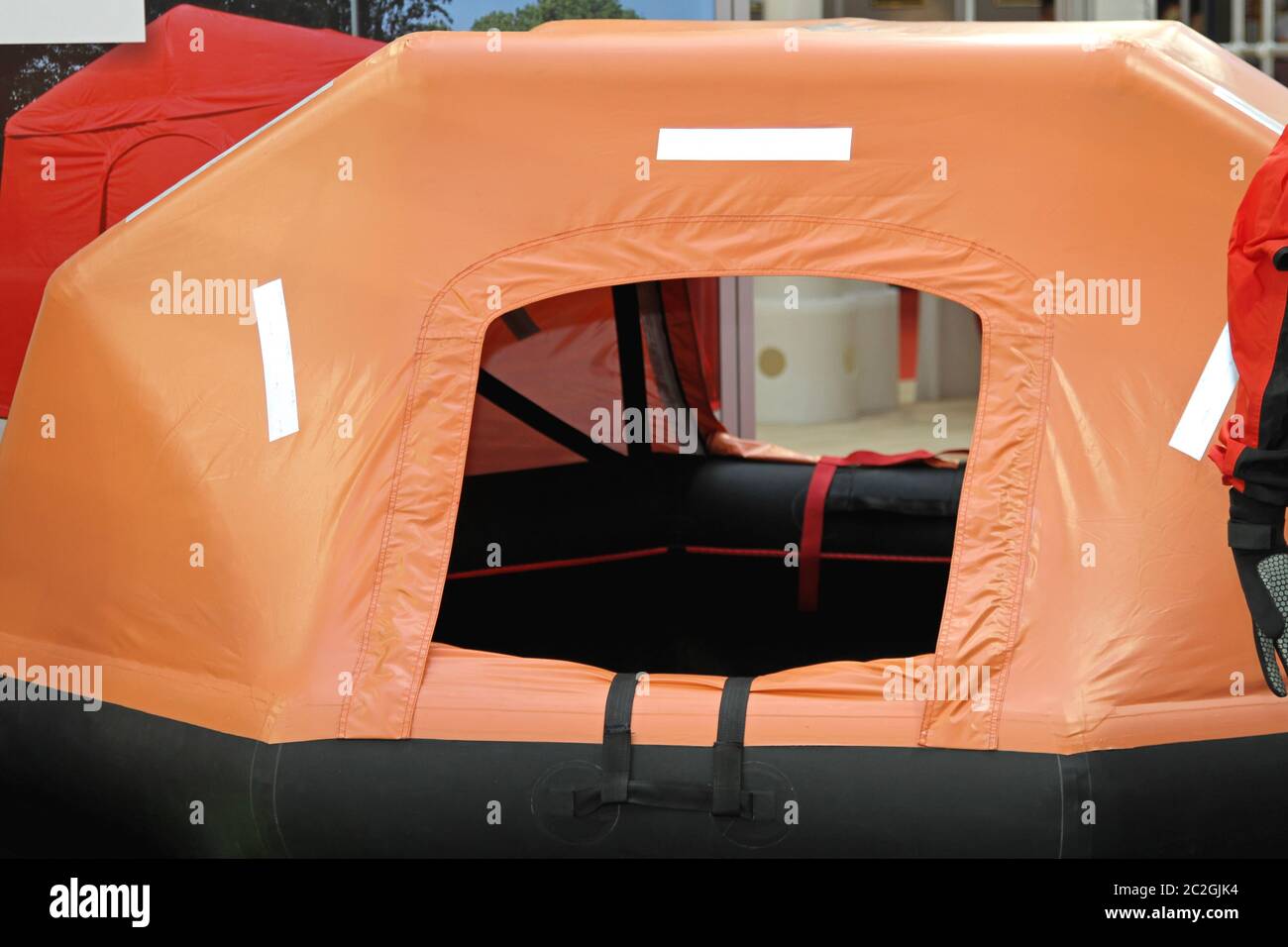 Inflatable Orange Lifeboat Life Raft Safety Equipment Stock Photo - Alamy