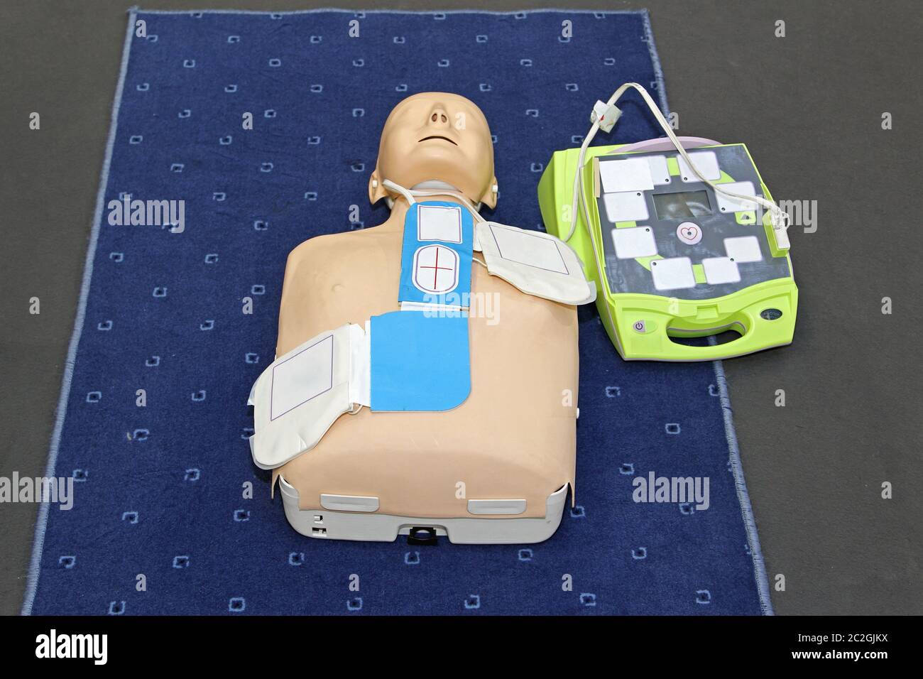 Automated External Defibrillator With Training Dummy Mannequin Stock ...