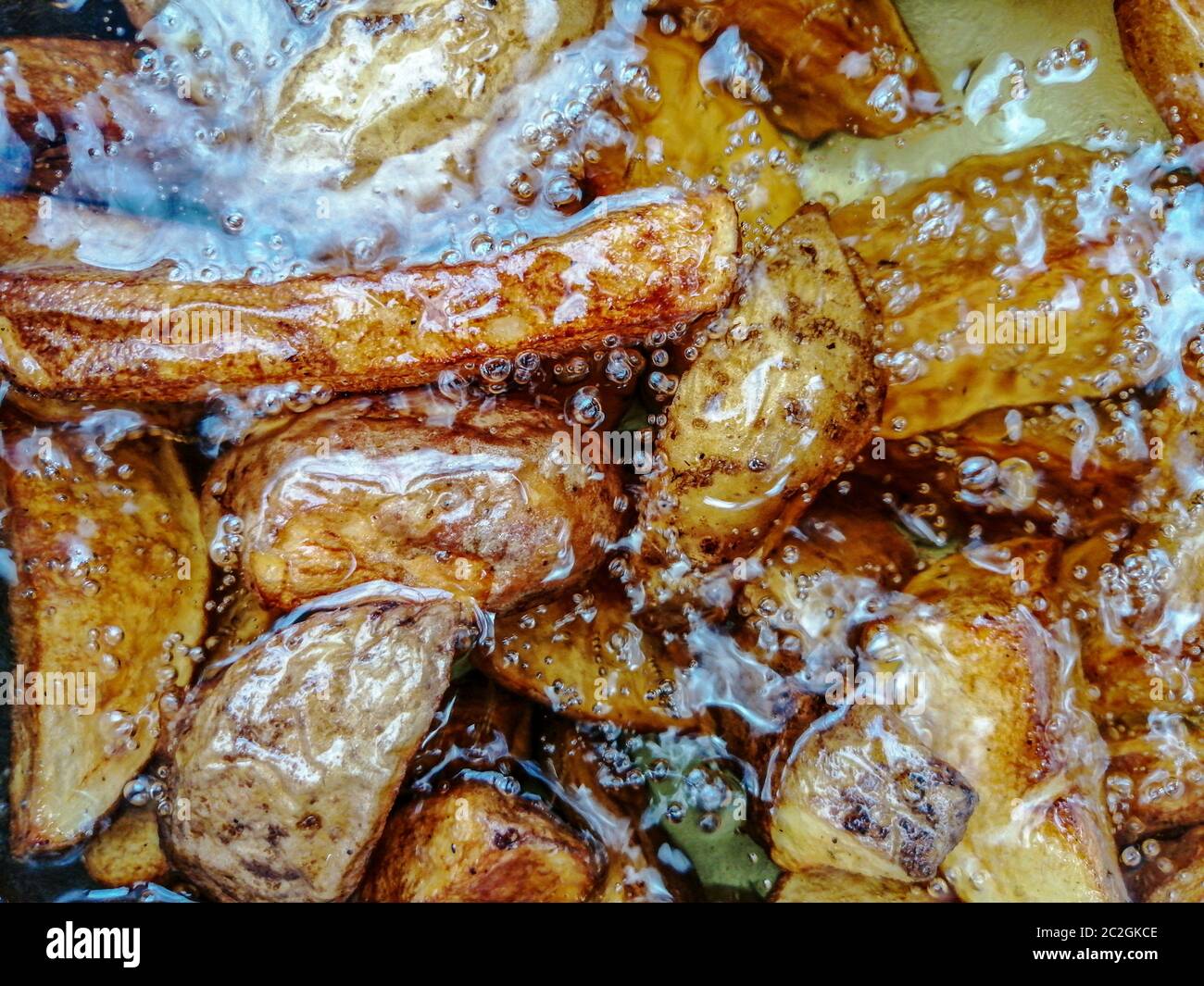 French Fries Boiling In Hot Oil close up Stock Photo - Alamy