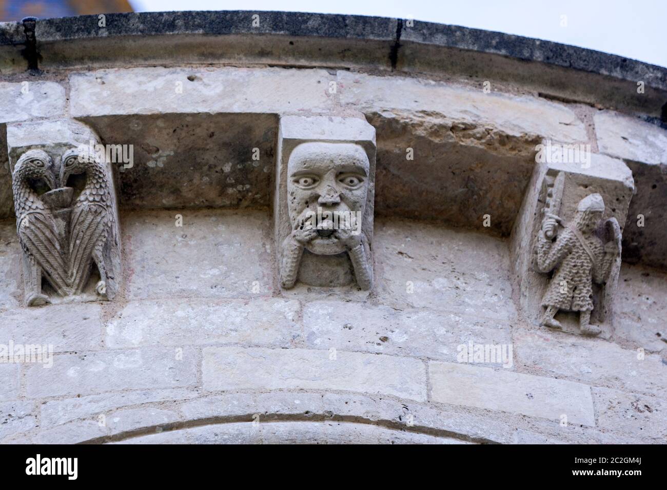 Stone corbel in Medieval church of Church of Saint-Pierre d'Aulnay ...