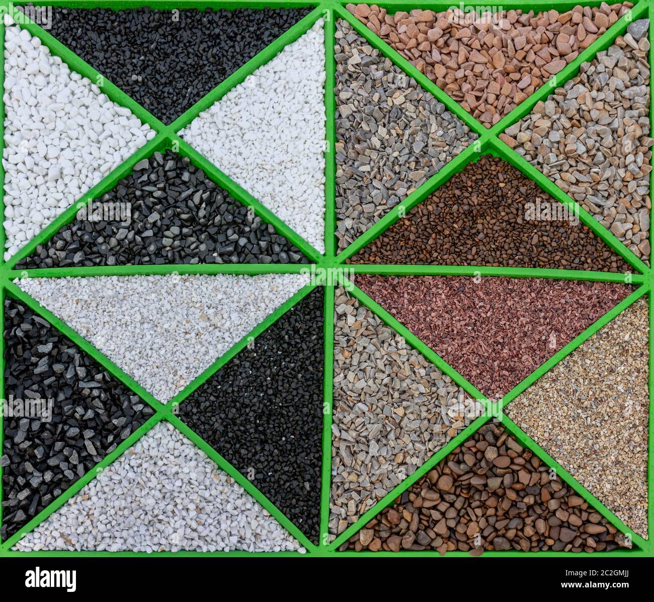 Multi-colored samples of marble, granite, and travertine chips and ...