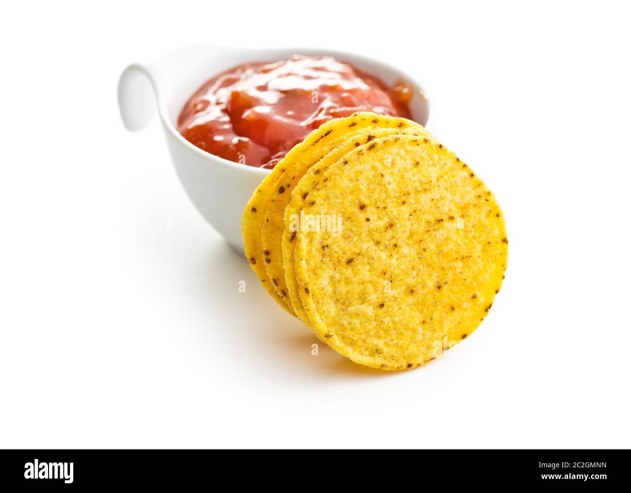 Round corn nacho chips and tomato dip. Yellow tortilla chips and salsa ...