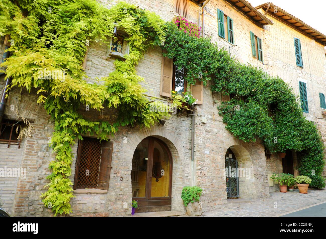 Italian old city. Typical Italian medieval houses in old town street in ...