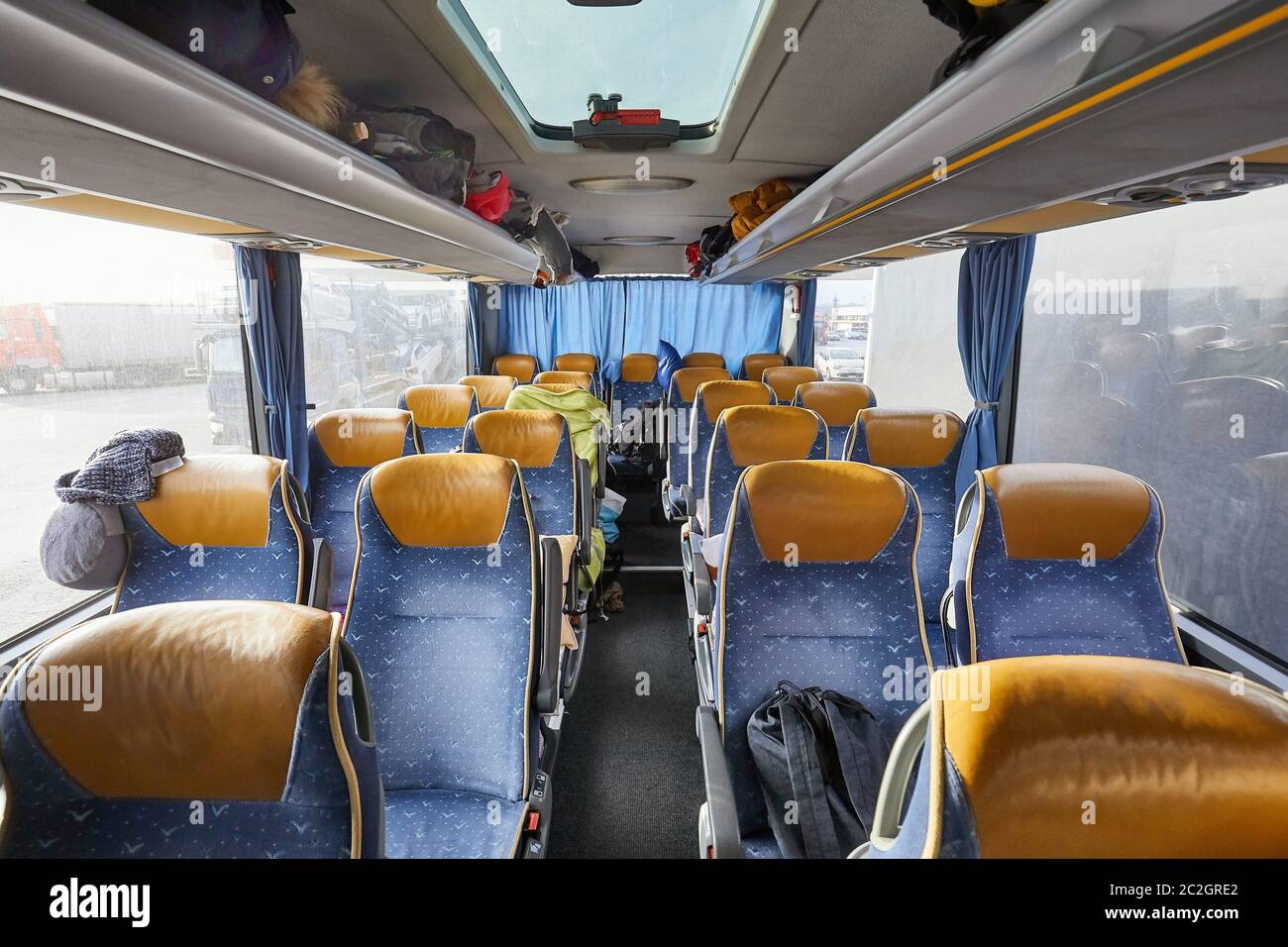 Bus interior empty seats, stop on a long distance trip Stock Photo - Alamy