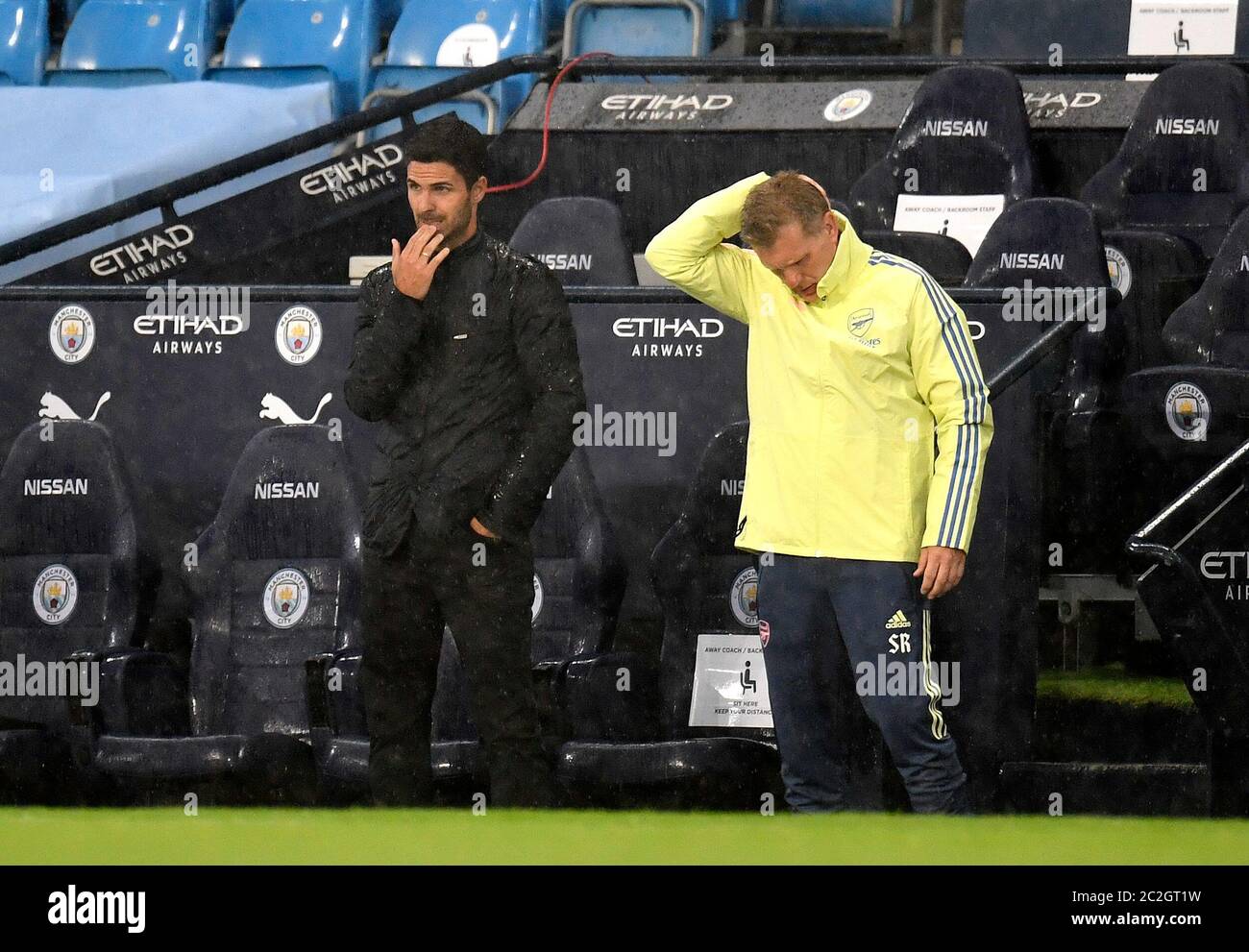 Arsenal manager Mikel Arteta (left) and assistant Steve Round during ...