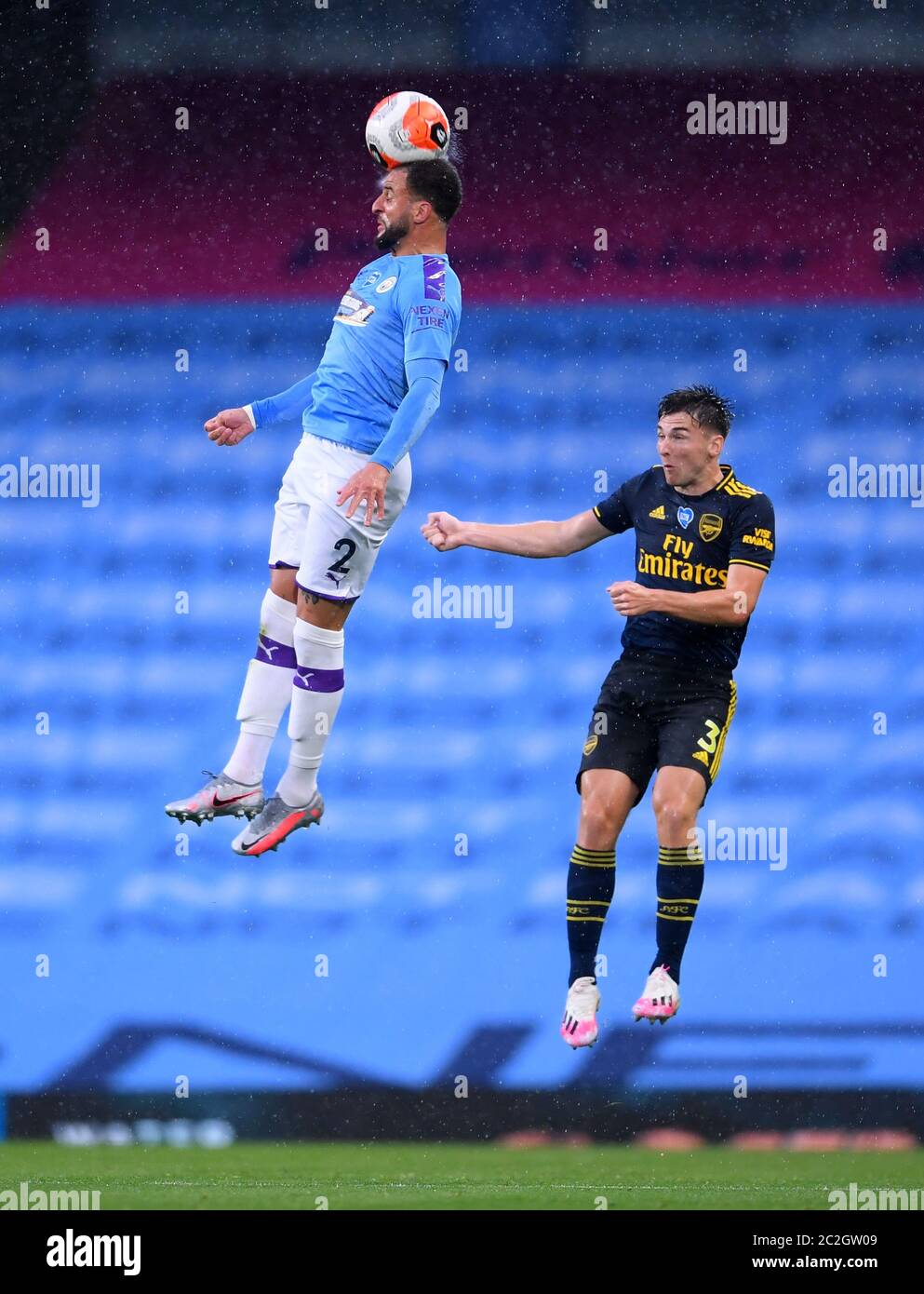 Manchester City's Kyle Walker and Arsenal's Kieran Tierney battle for ...