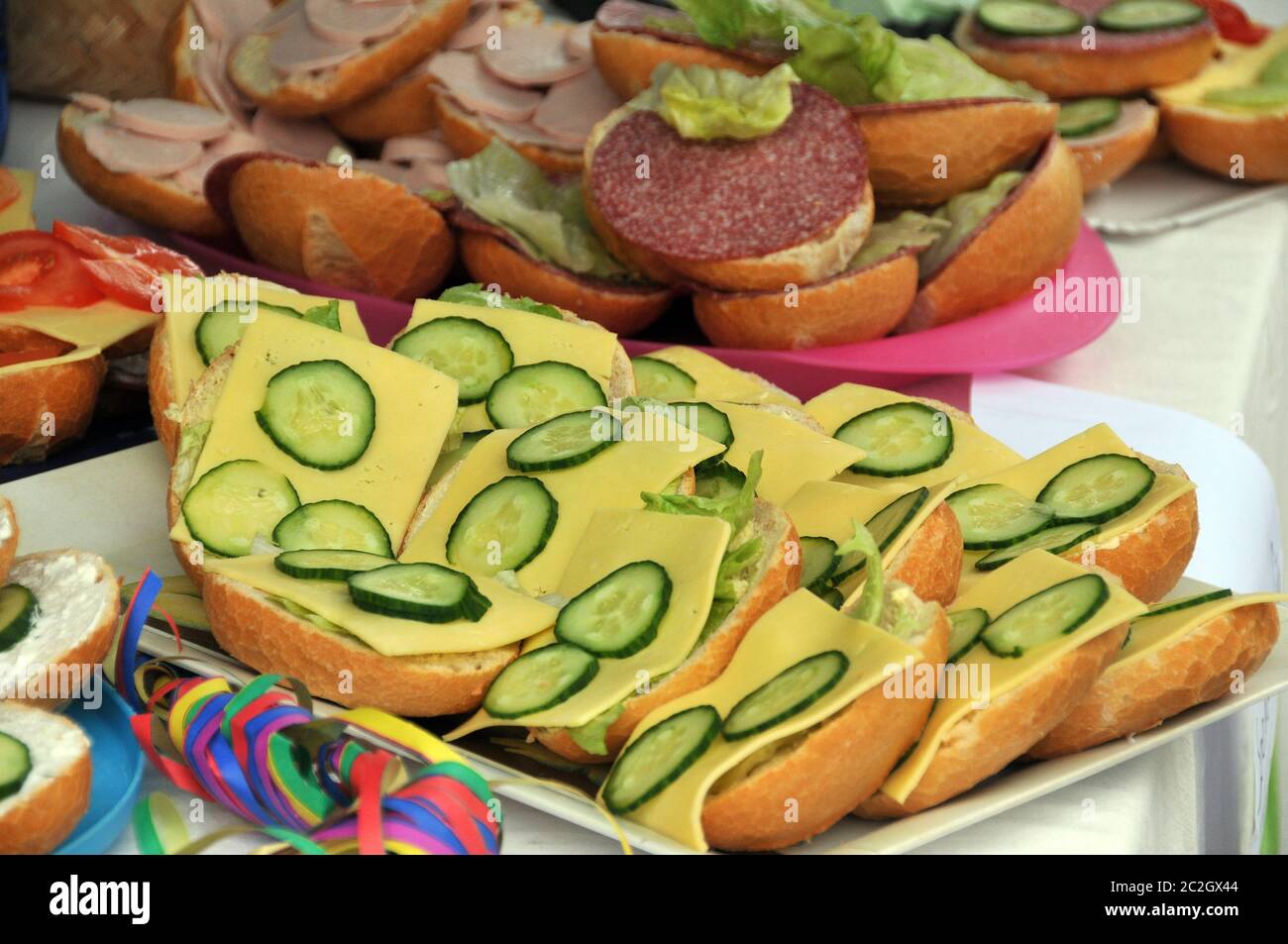 Cold plate with cheese rolls Stock Photo - Alamy