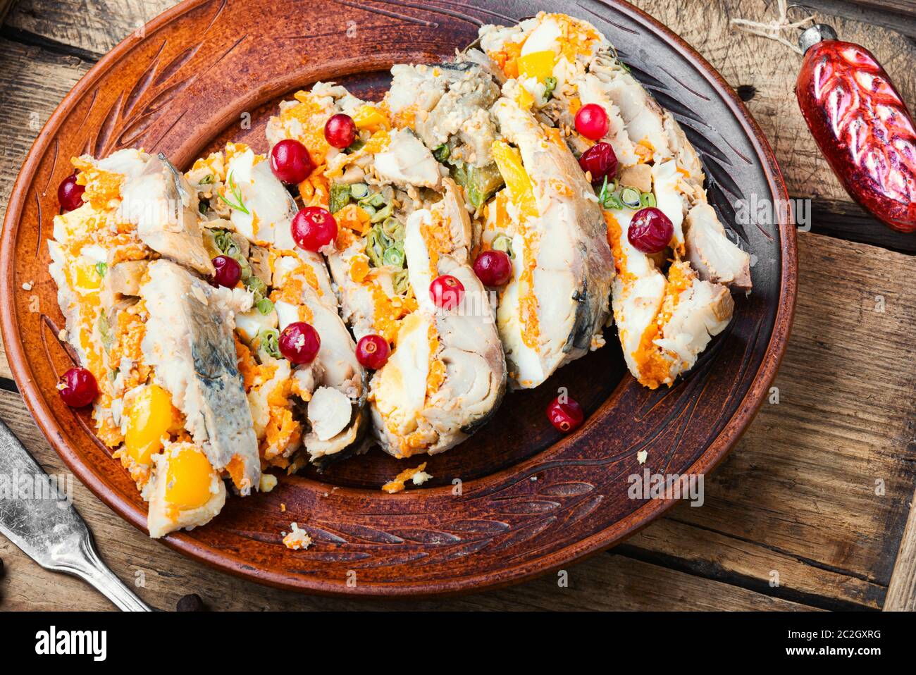 Fish roll.Fish stuffed with vegetables.Banquet dish or Christmas food ...