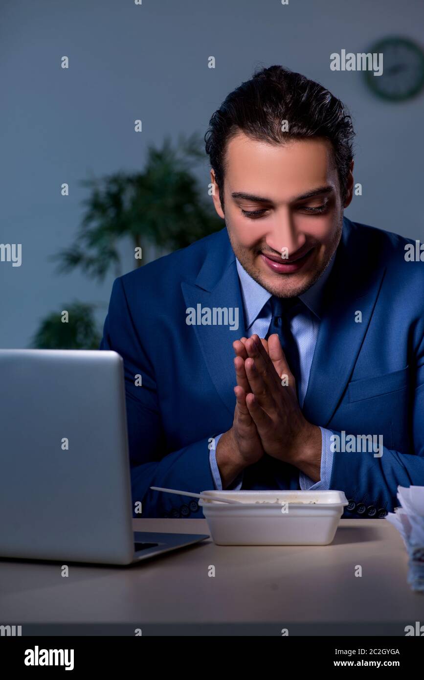 Work at night eat at desk hi-res stock photography and images - Alamy