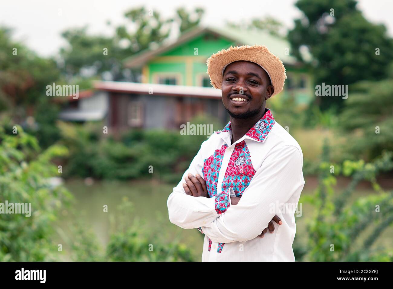 Portrait of african man wearing native cloth traditional colorful with ...