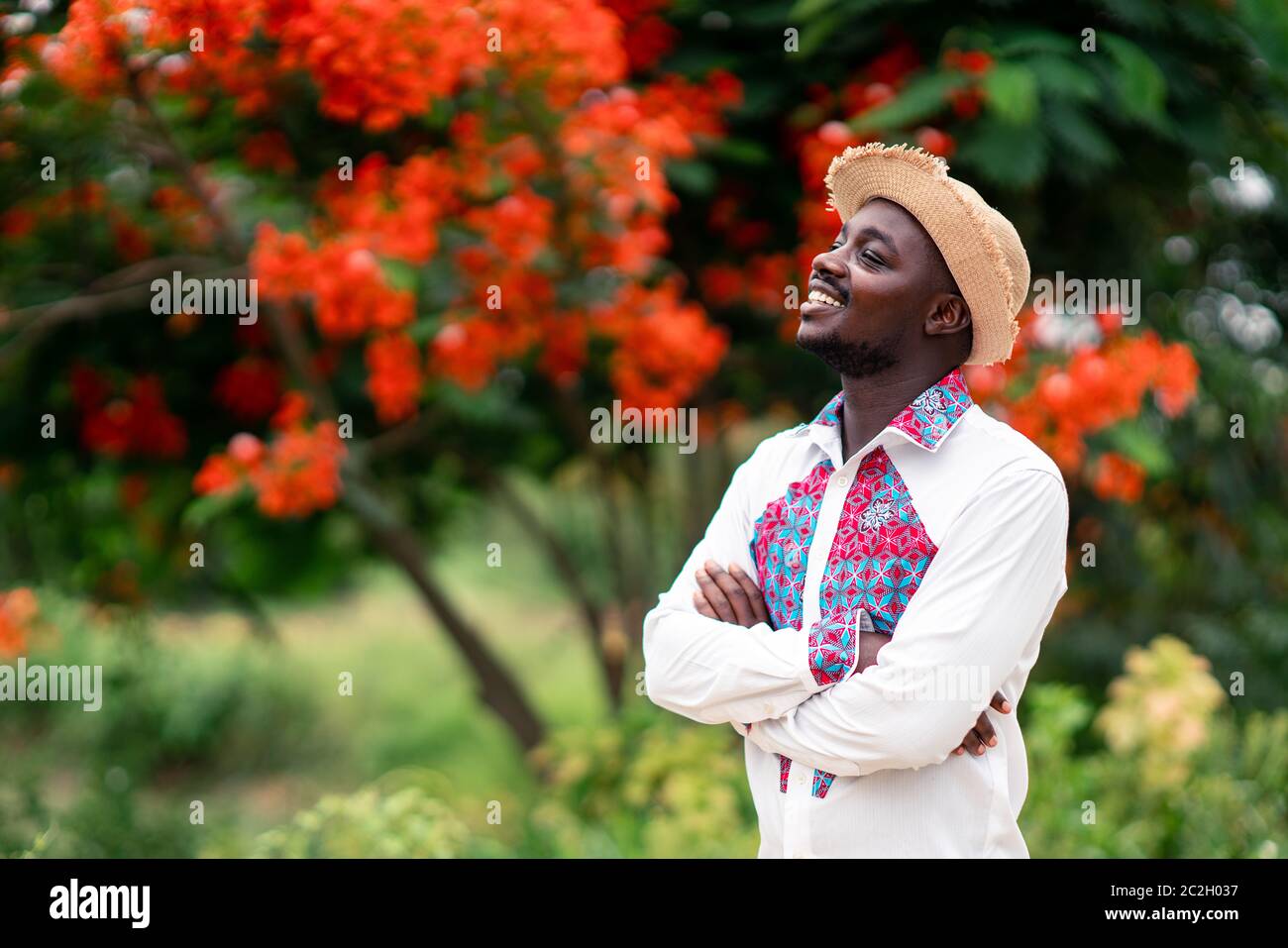Portrait of african man wearing native cloth traditional colorful with ...