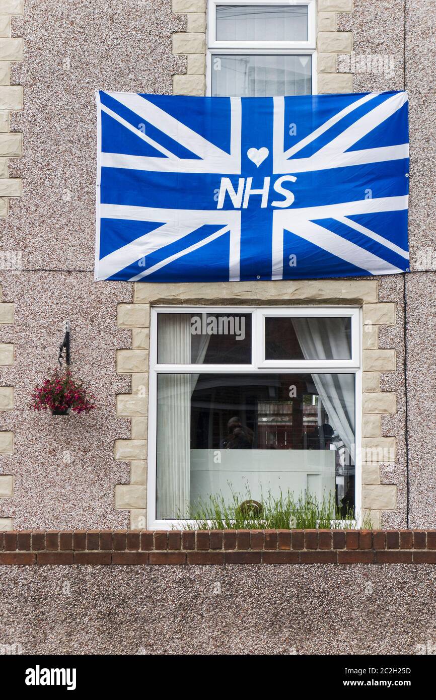 UK home displays a flag in suort of the NHS during the 2020Coronavirus ...