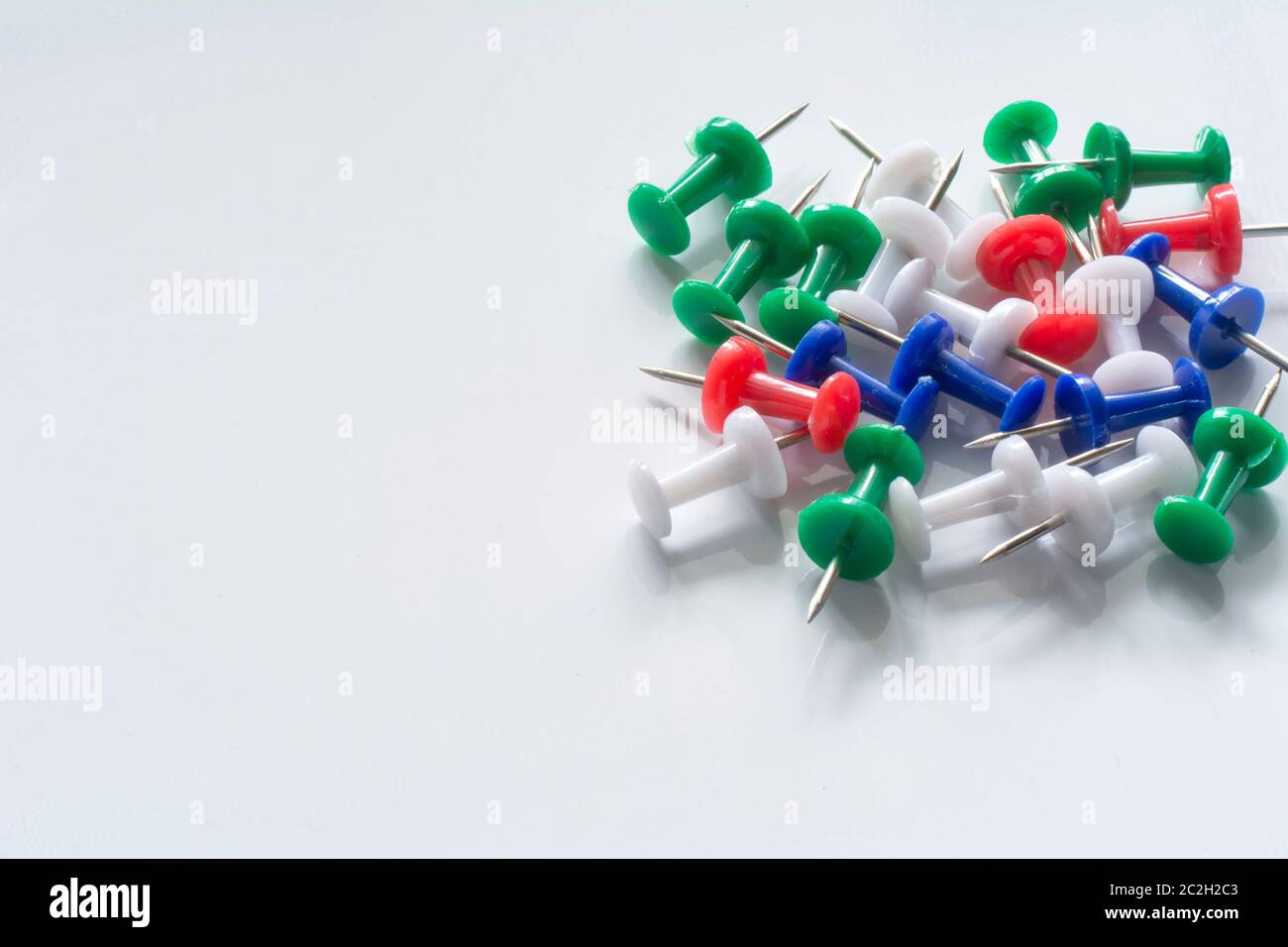 Office or school objects. Multi colored Push Pins isolated on White ...
