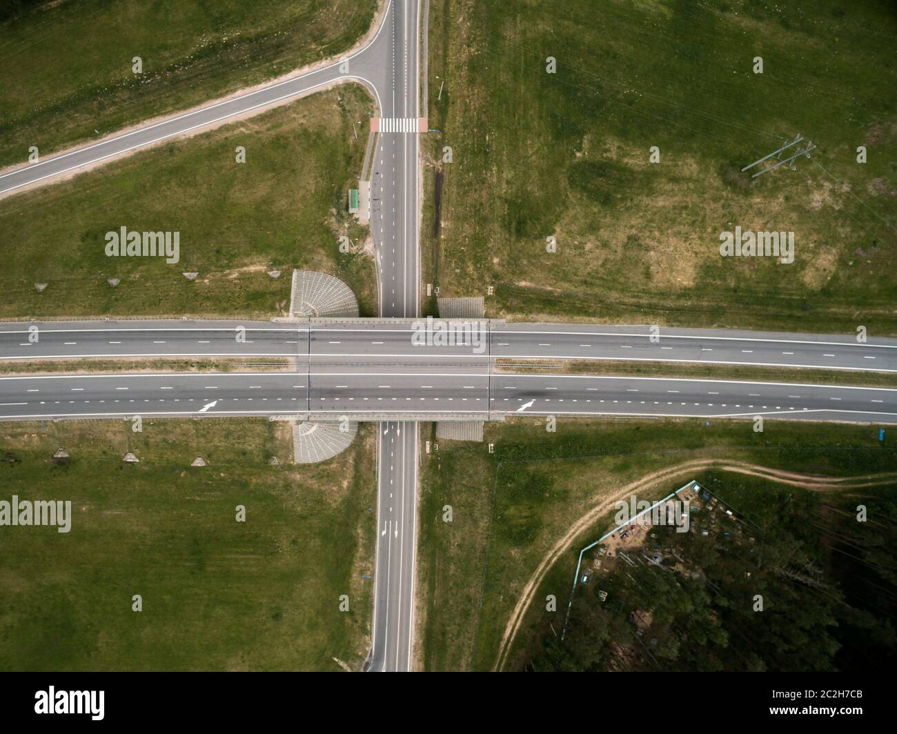 Asphalt highway and bridge road. Top view. Summer landscape. Drone ...