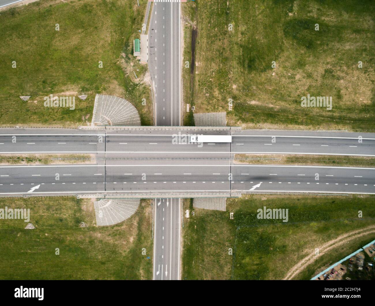 Asphalt highway and bridge road. Top view. Summer landscape. Drone ...