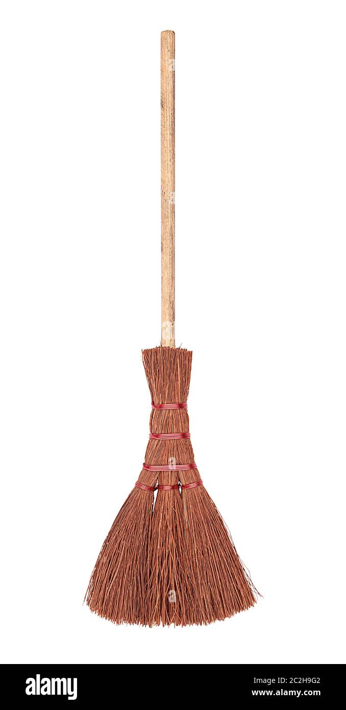Decorative broom made of thin tree branches with a thin wooden handle ...