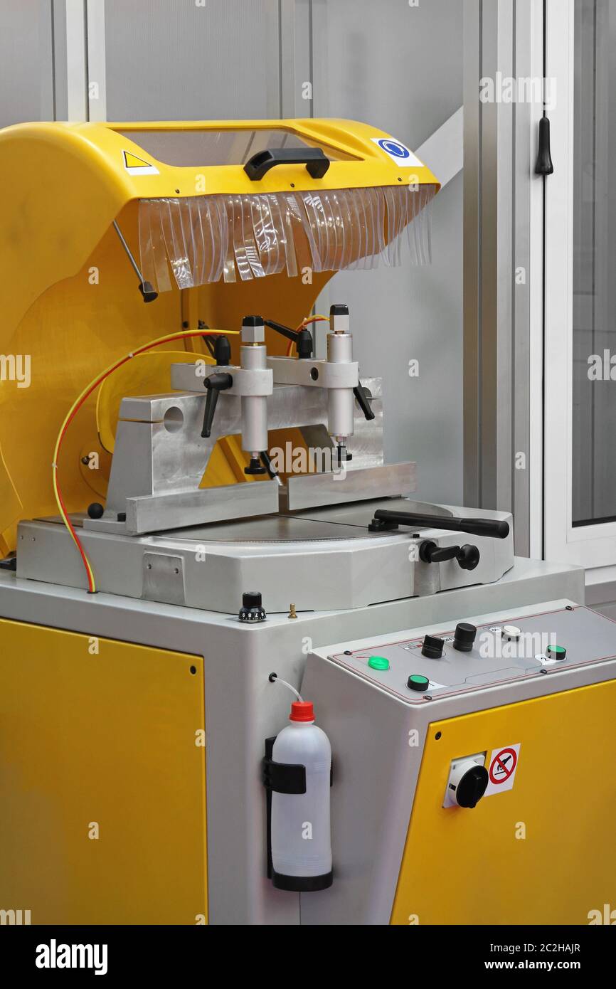 Cutting Off Machine Tool in Window Factory Stock Photo - Alamy