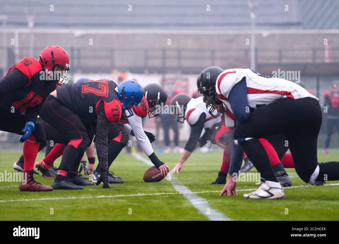 professional american football players ready to start Stock Photo - Alamy