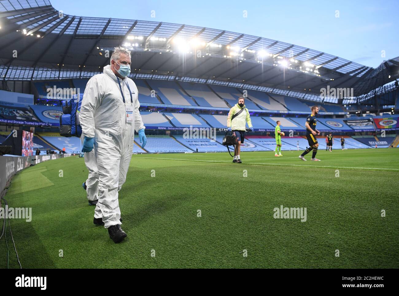 Medical staff wearing PPE during the Premier League match at the Etihad ...