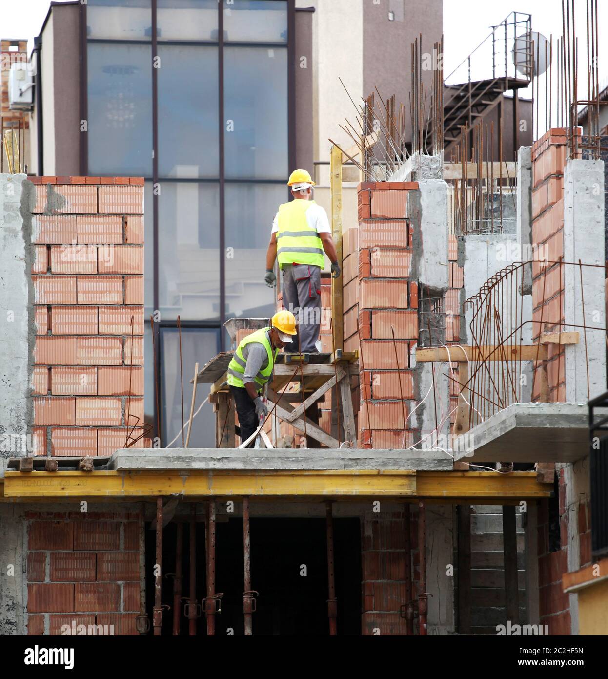 New Construction Site. Workers Build A Home Stock Photo - Alamy